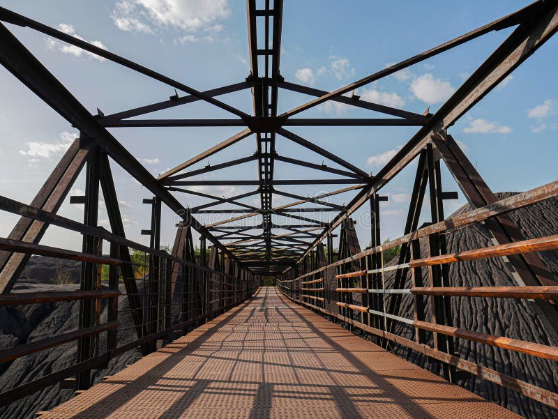 Old, Rusty Iron Bridge for Crossing Over the Rails Stock Image - Image ...