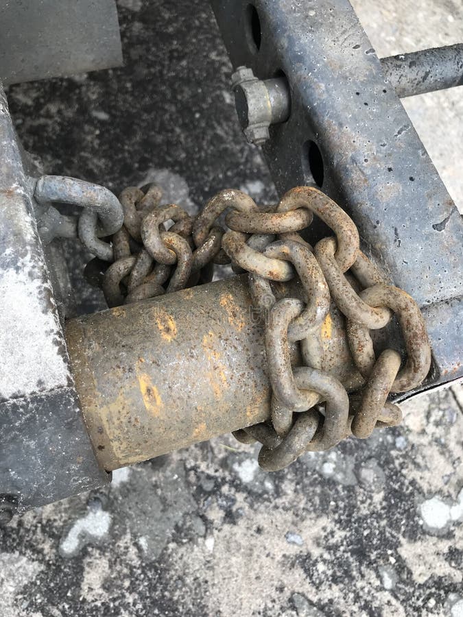 Old Rusty Iron Chain Wrapped Around a Steel Stock Photo - Image of ...