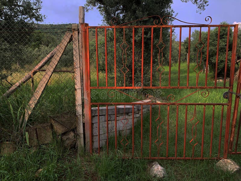 Old Red Iron Gate in the Forest Stock Photo - Image of countryside ...