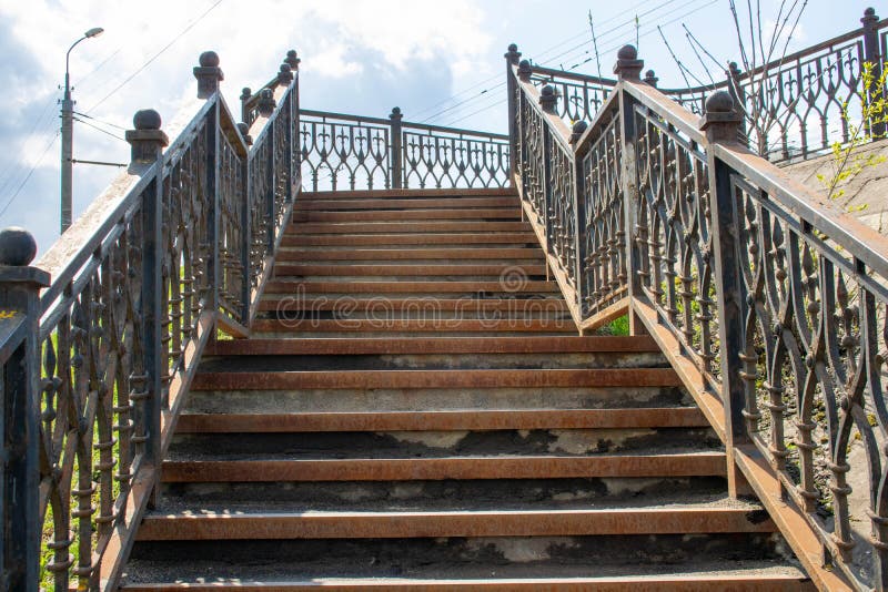 Old Rusty Iron Staircase. the Railings and Steps Were Stained with Rust ...