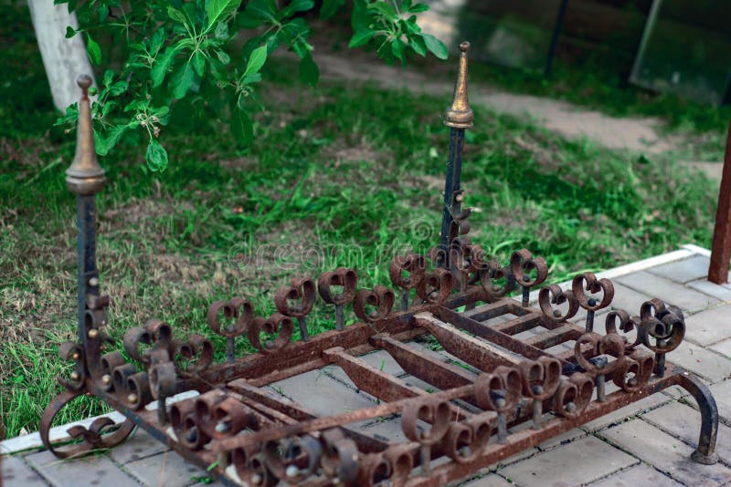 Old Rusty Iron Stand for Skewers Stock Photo - Image of isolated ...
