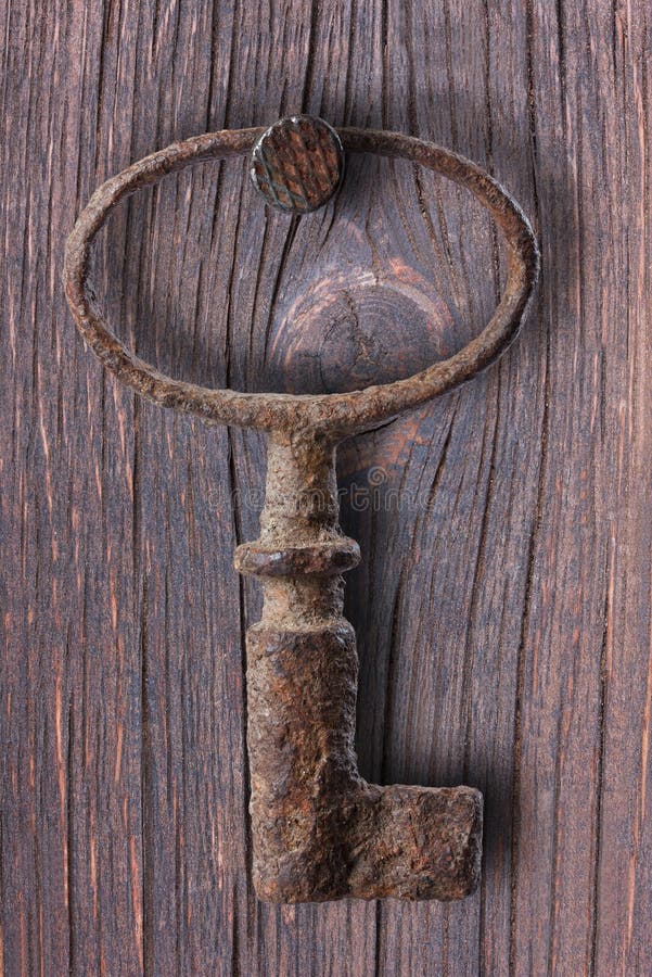 Old Rusty Key Hanging on the Wall, Metal, Rust, Nail. Stock Image ...