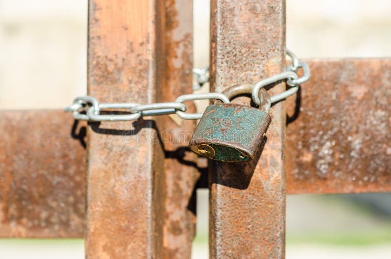 Old Rusty Key Lock Locked with a Chain Stock Image - Image of stability ...