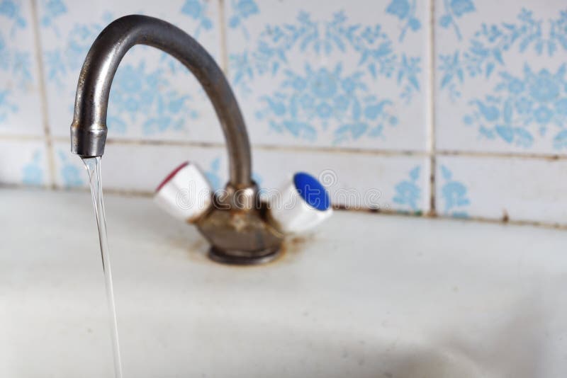 Old, Rusty Kitchen Mixer Mounted on an Enameled Sink Stock Photo ...