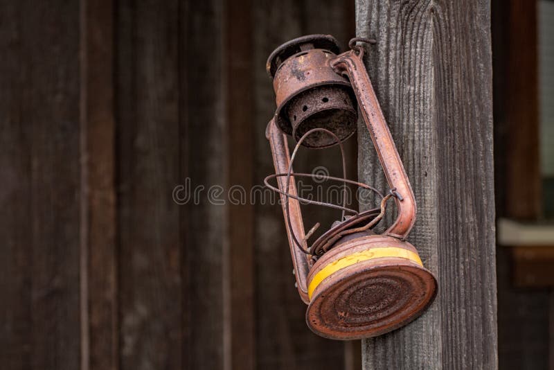 Old,rusty Lamp Hanging on Post Stock Photo - Image of brown, rusty ...