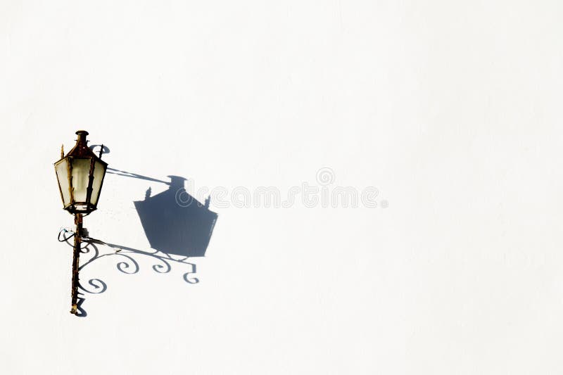 Old Rusty Lamppost on a White Wall Stock Image - Image of exterior ...