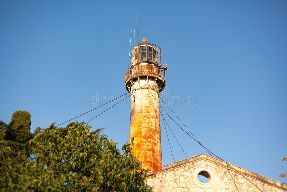 Old rusty lighthouse stock image. Image of blue, landscape - 202855081