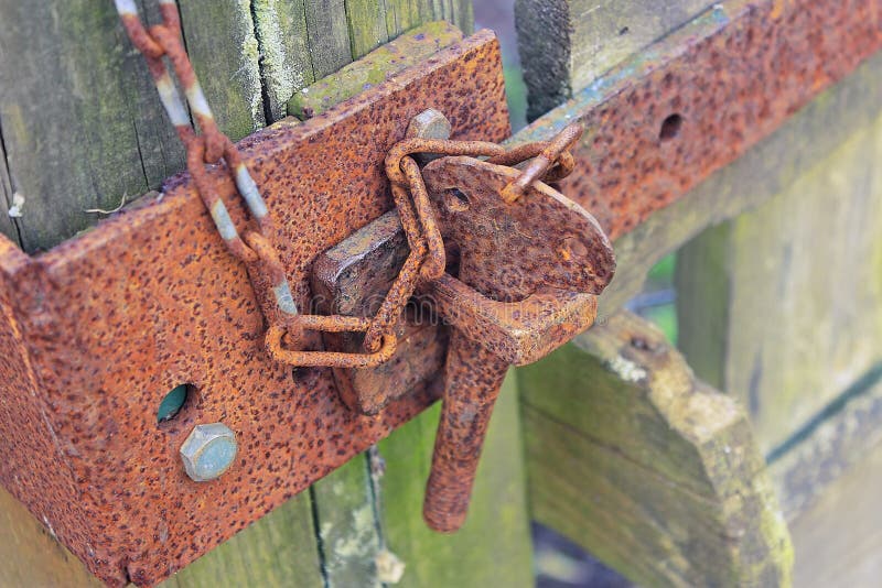 Old rusty lock and chain stock image. Image of brown - 99424075