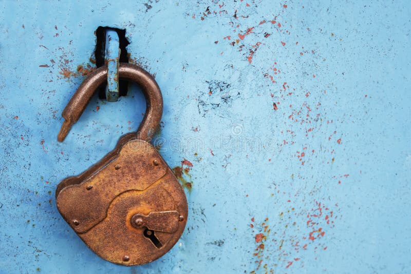 Old Rusty Lock Without A Key On A Blue Background Stock Photo - Image ...