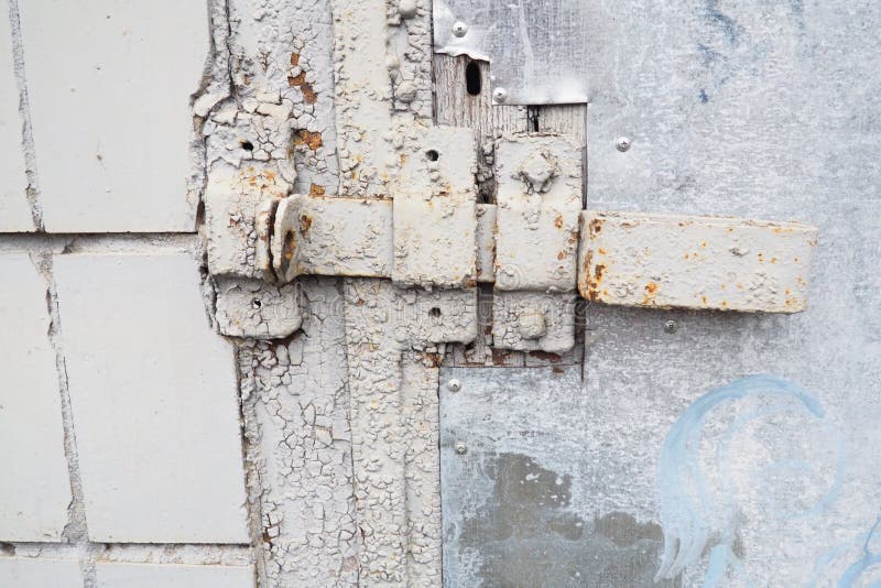 Old Rusty Lock with a Thick Layer of Gray Paint. Texture of Wood with ...