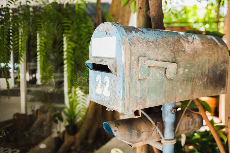 Old and Rusty Mail Box Standing in Garden Under Tree Stock Image ...