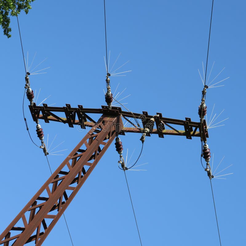 Old Rusty Mast with a Power Line Above Front of Blue Sky Stock Photo ...