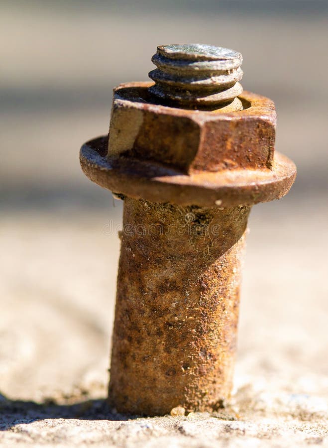 Old rusty metal bolt stock photo. Image of wall, industry - 187704432