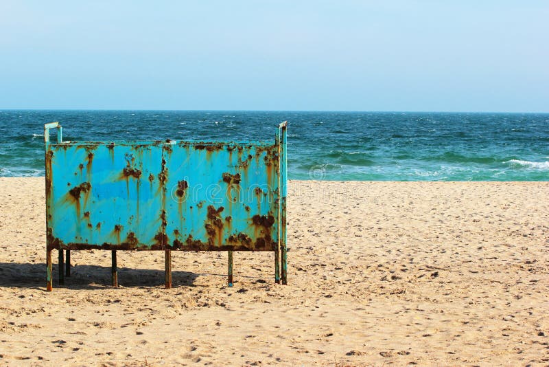 Old Rusty Metal Cabana on Empty Sandy Beach Stock Photo - Image of ...