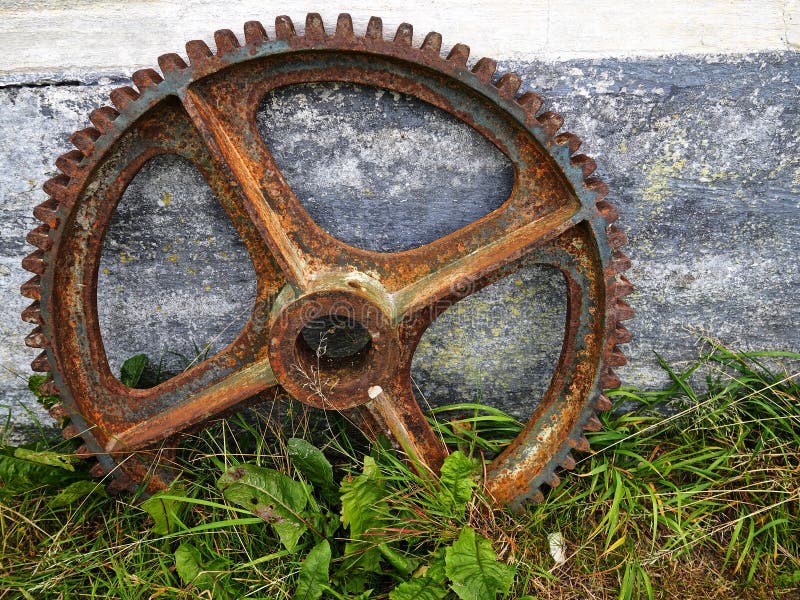 Old Rusty Metal Cog Wheel on a Wall Stock Image - Image of obsolete ...