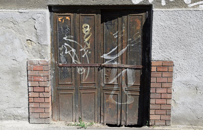 Old rusty metal door stock photo. Image of wall, brown - 54677860