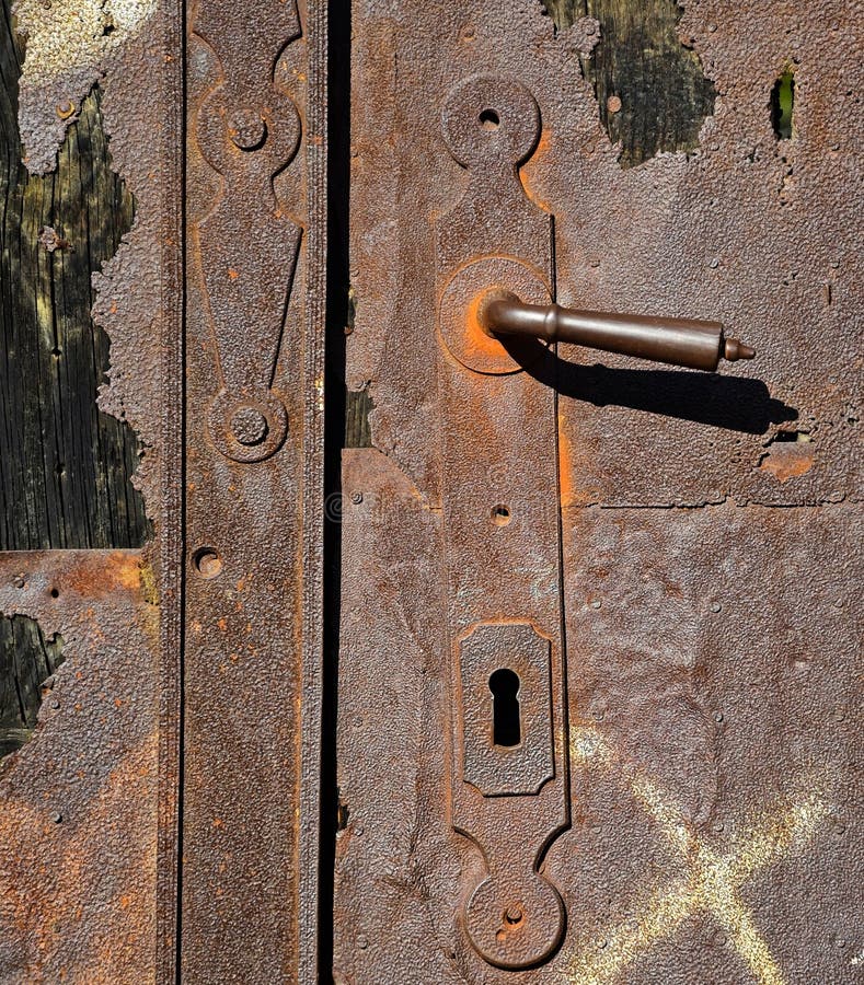 Old Rusty Metal Door with Handle Stock Photo - Image of ornate, closeup ...