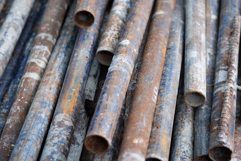 Pile of rusty metal pipes stock photo. Image of background - 6212752