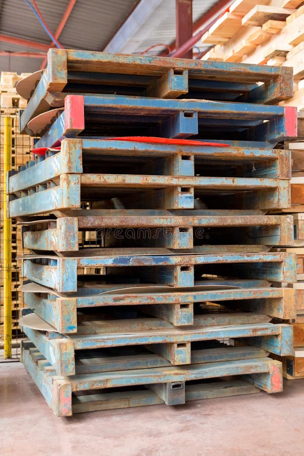 Old Rusty Metal Pallets in Production Stock Photo - Image of business ...