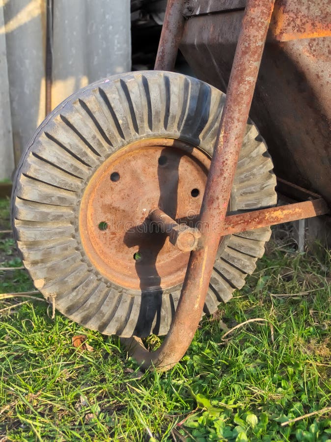 Old Rusty Metal and Rubber Wheel of Hand-barrow Stock Photo - Image of ...