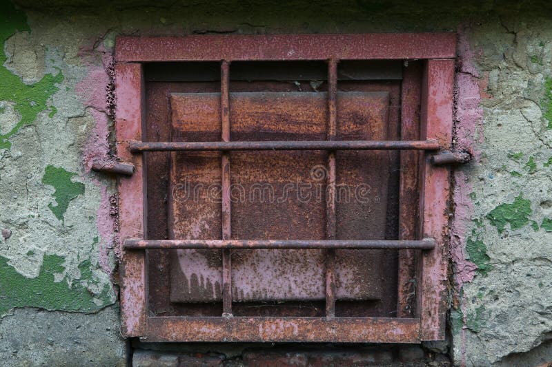 Old Rusty Metal Window with Grating on a Peeling Wall Stock Image ...