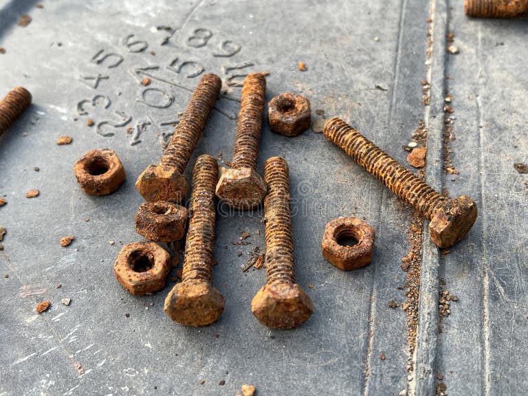Old Rusty Nails on the Plastic Floor Stock Image - Image of background ...