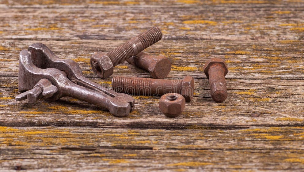 Old Rusty Nuts, Bolts. Ancient Tools. Boards Stock Photo - Image of ...