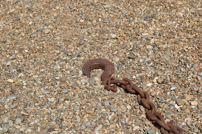 Old Rusty Orange Brown Nautical Chain with Hook Lying on Shingle Beach ...