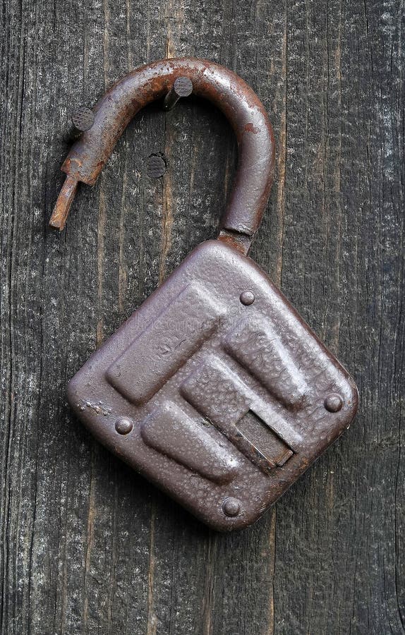 Old Rusty Padlock Attached To an Old Plank Wall Stock Photo - Image of ...