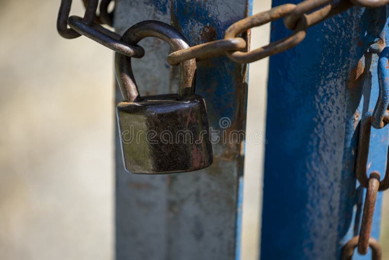 Old Rusty Padlock and Chain on Metal Door. Old Locked Gate with Chains ...