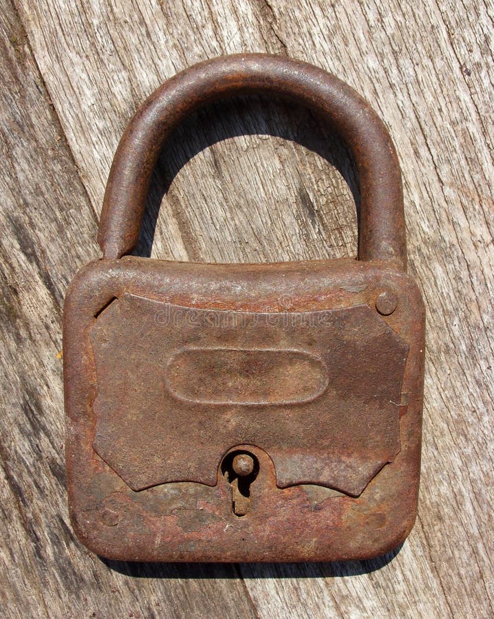 Old Rusty Padlock and Latch on a Wooden Door Stock Image - Image of ...