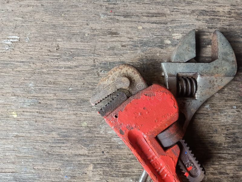 Old Rusty Pipe Wrench and Adjustable Wrench with Wood Texture ...