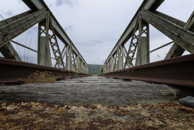 Old rusty railway bridge stock image. Image of iron - 228276387