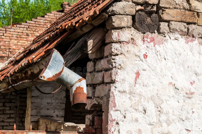 Old and Rusty Rain Gutter on Abandoned House Damaged by Age and Water ...