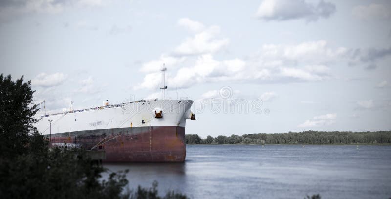 Old Rusty Red and White Cargo Ship Waiting for Unload Stock Photo ...