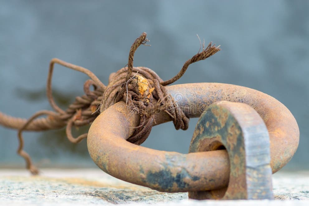 Old Rusty Ring with the Broken-off Iron Cable Stock Photo - Image of ...