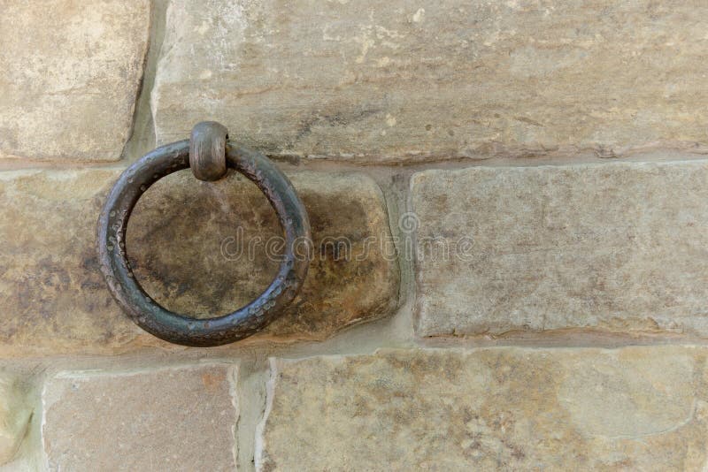 Old Rusty Ring Fixed in a Stone Brick Wall Stock Photo - Image of ...