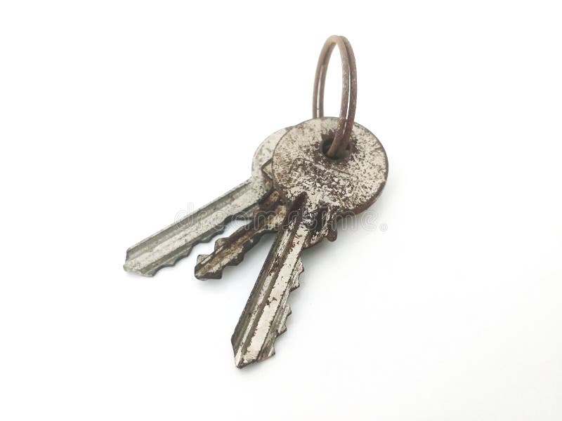 A Key Chain Isolated on White with Rusty Keys of Different Sizes. Old ...