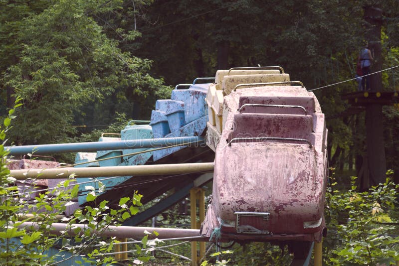Old Rusty Roller Coaster in an Abandoned Park with a Hot Summer Stock ...