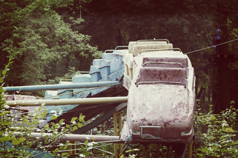Old Rusty Roller Coaster in an Abandoned Park with a Hot Summer Stock ...