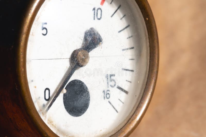 Old Rusty Round Industrial Pressure Gauge with Numbers on a White Dial ...