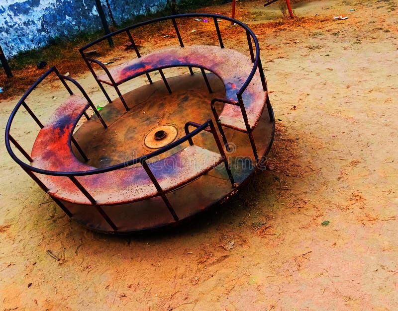 An old rusty round roller stock image. Image of swings - 201246871