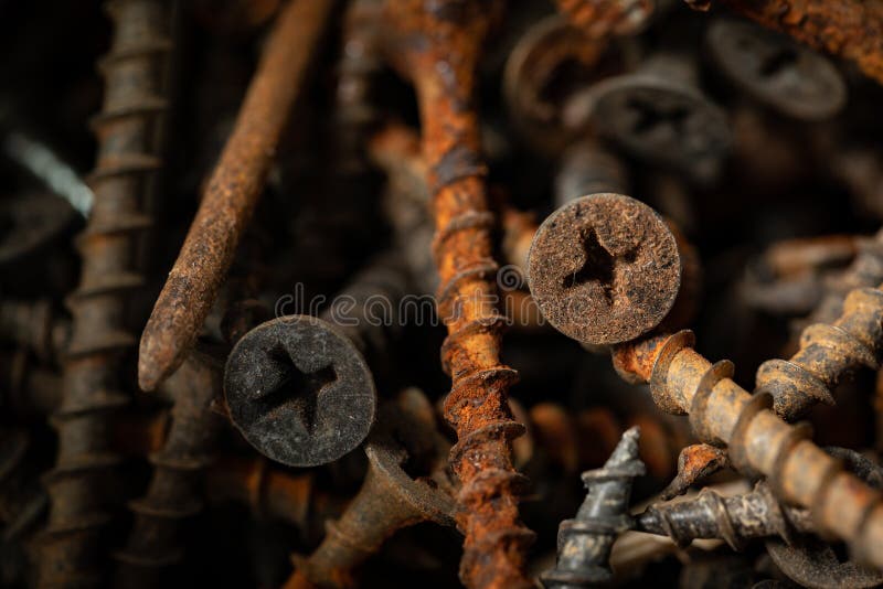 Old Rusty Screws and Nails. Background for Construction and Industry ...
