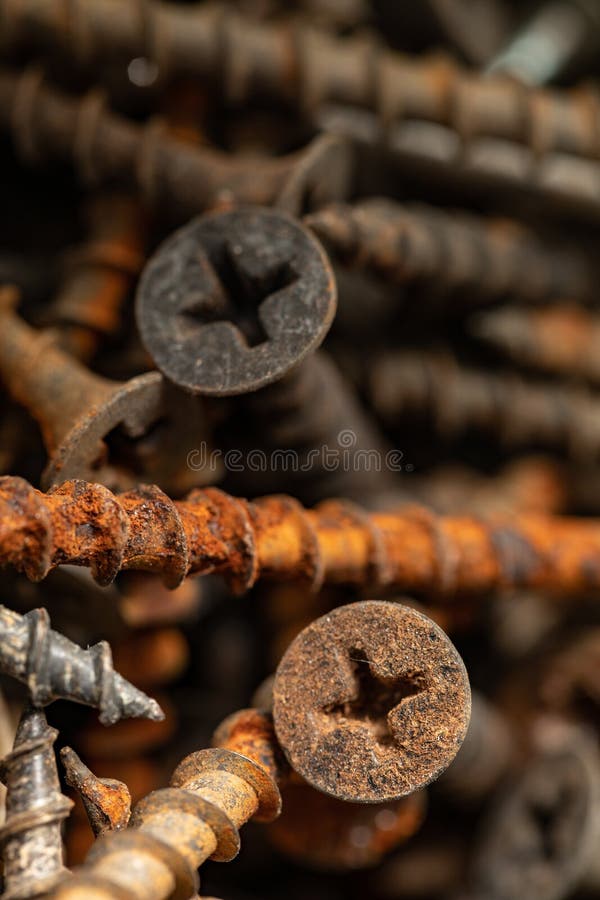 Old Rusty Screws and Nails. Background for Construction and Industry ...