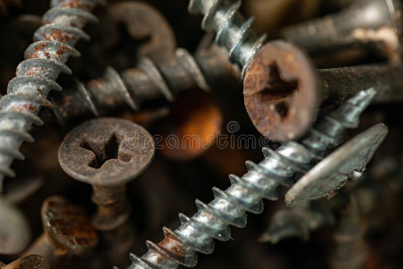Old Rusty Screws and Nails. Background for Construction and Industry ...