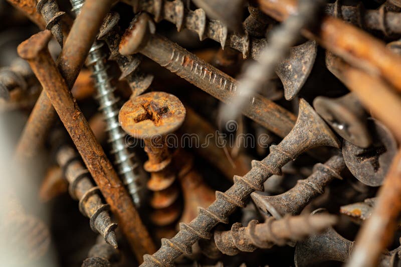 Old Rusty Screws and Nails. Background for Construction and Industry ...