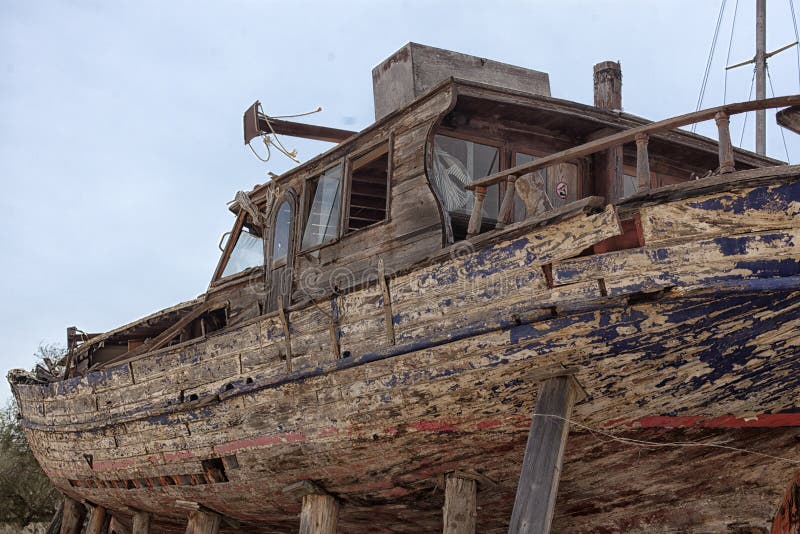 Old, Rusty Ship Abandoned on the Shore Stock Photo - Image of hull ...
