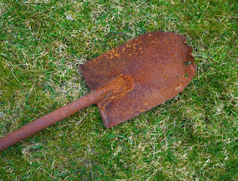 Old Rusty Shovel in the Dirt and Weeds Stock Image - Image of uncleaned ...