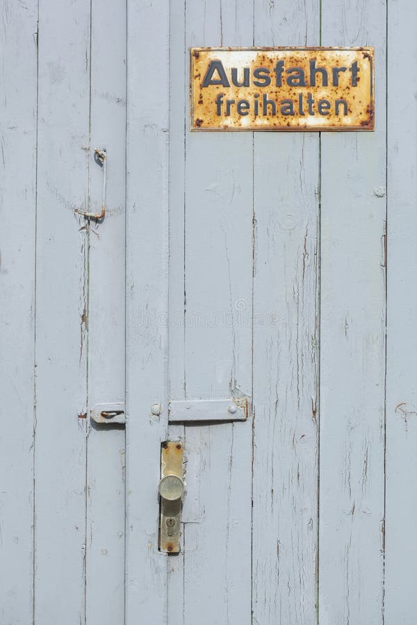 Old, Rusty Sign Keep Exit Clear Stock Photo - Image of exit, germany ...