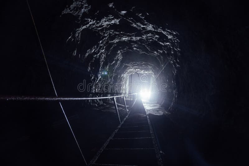 Old Rusty Stairs Going Down. Bright Light from Below Stock Photo ...